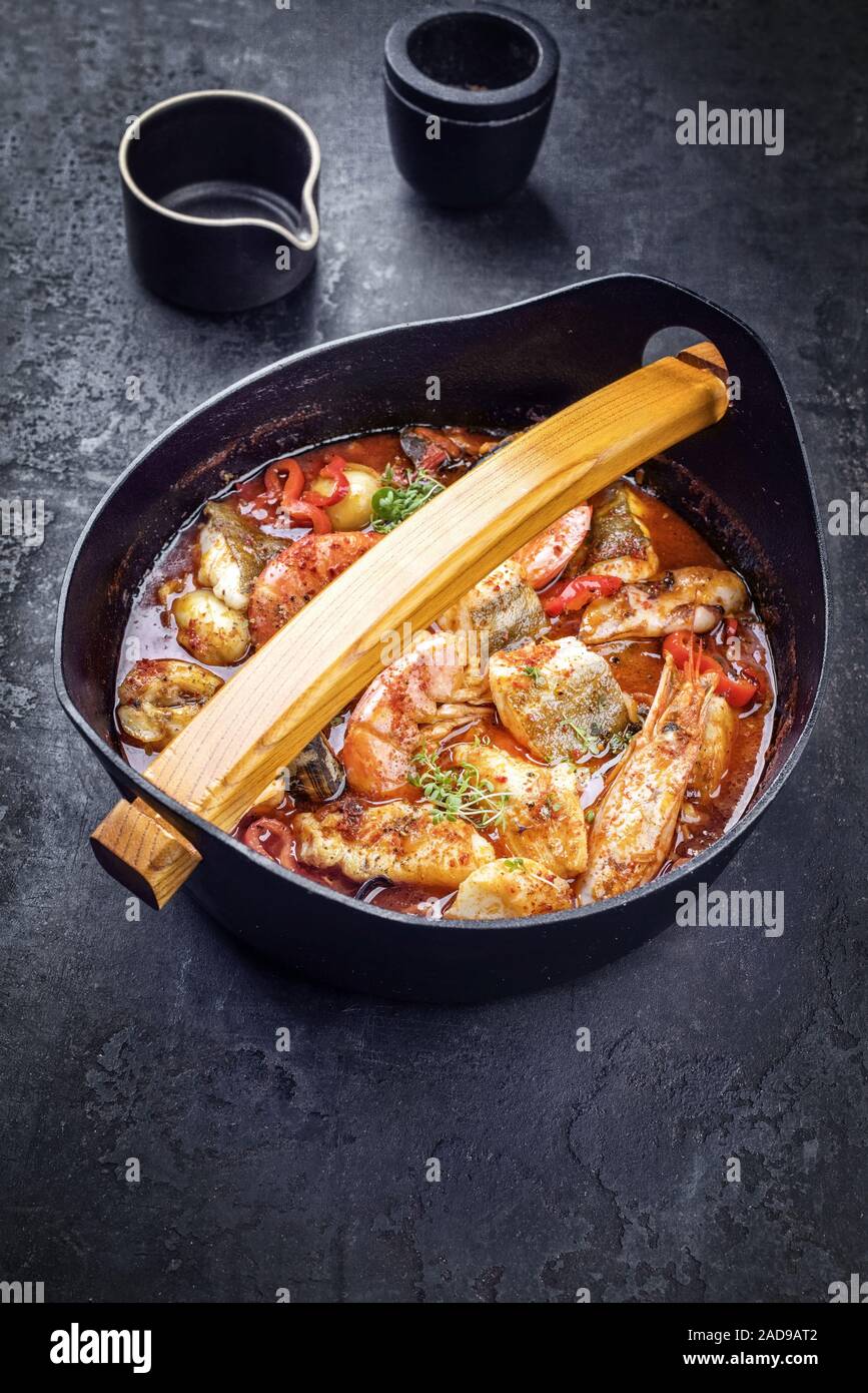 Traditional American cajun fish stew with prawns Stock Photo - Alamy