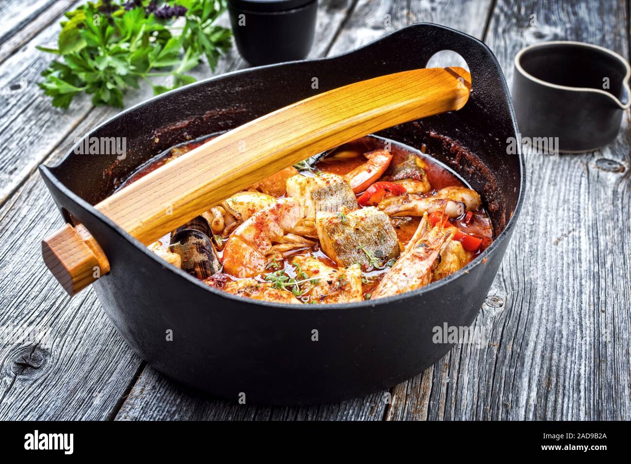 Traditional Catalan sarsuela seafood stew with prawns Stock Photo - Alamy