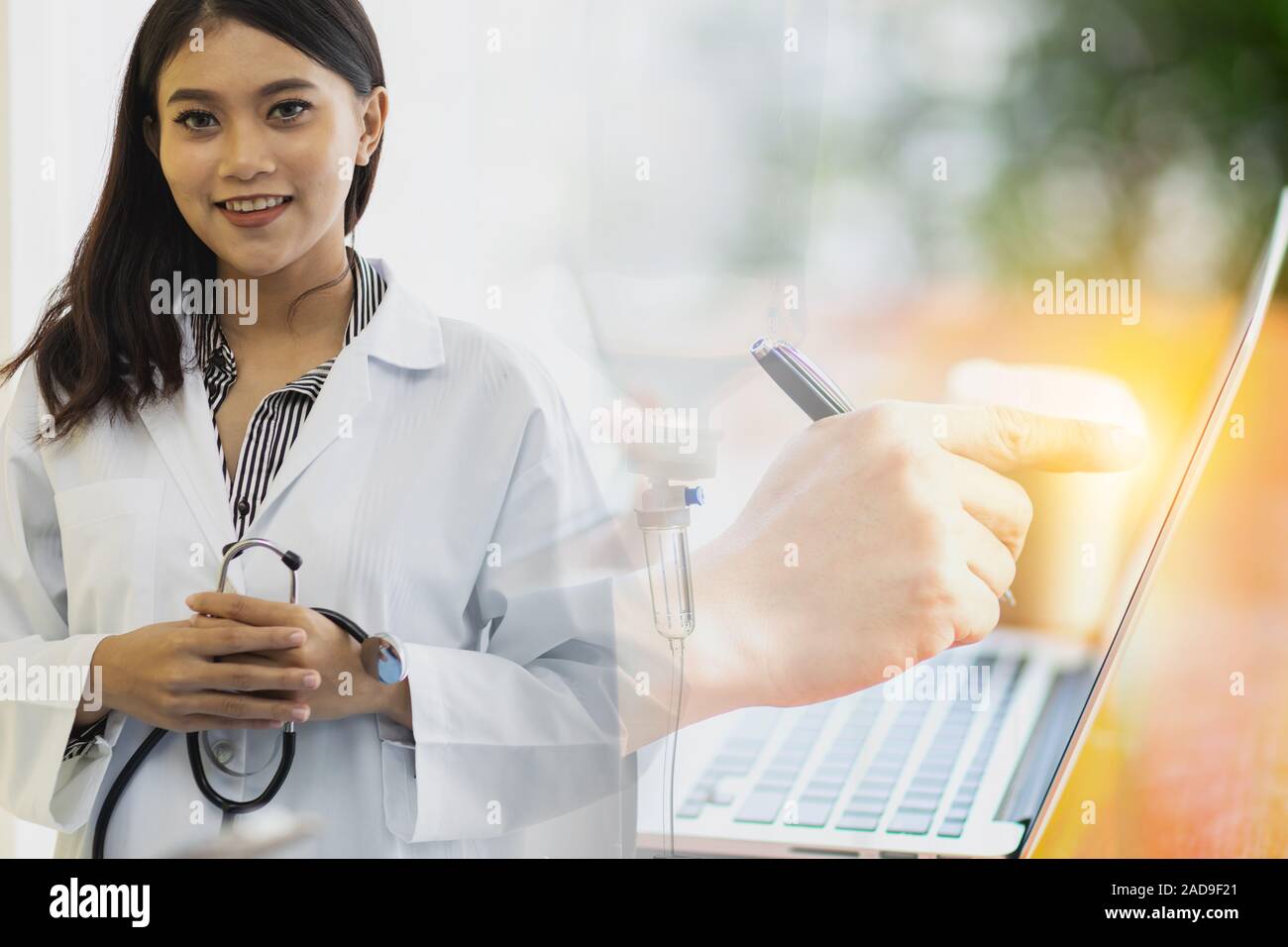 Young adult female doctor double exposure Stock Photo - Alamy