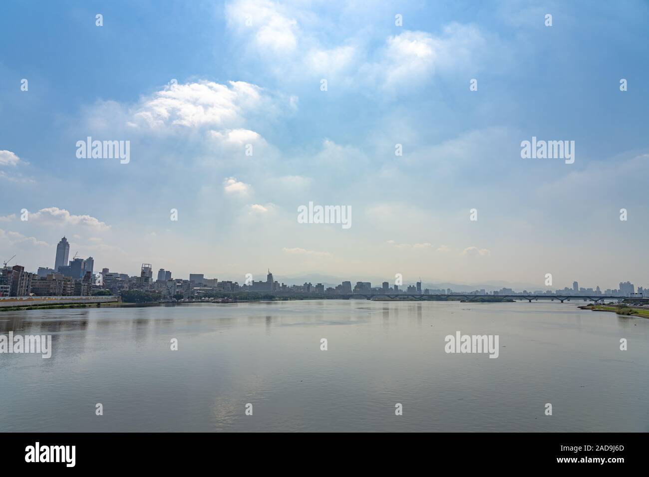Scenery view of Tamsui river bank, view on Taipei bridge, a bridge link ...