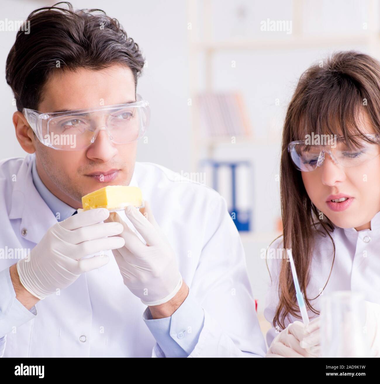 Two lab doctor testing food products Stock Photo - Alamy