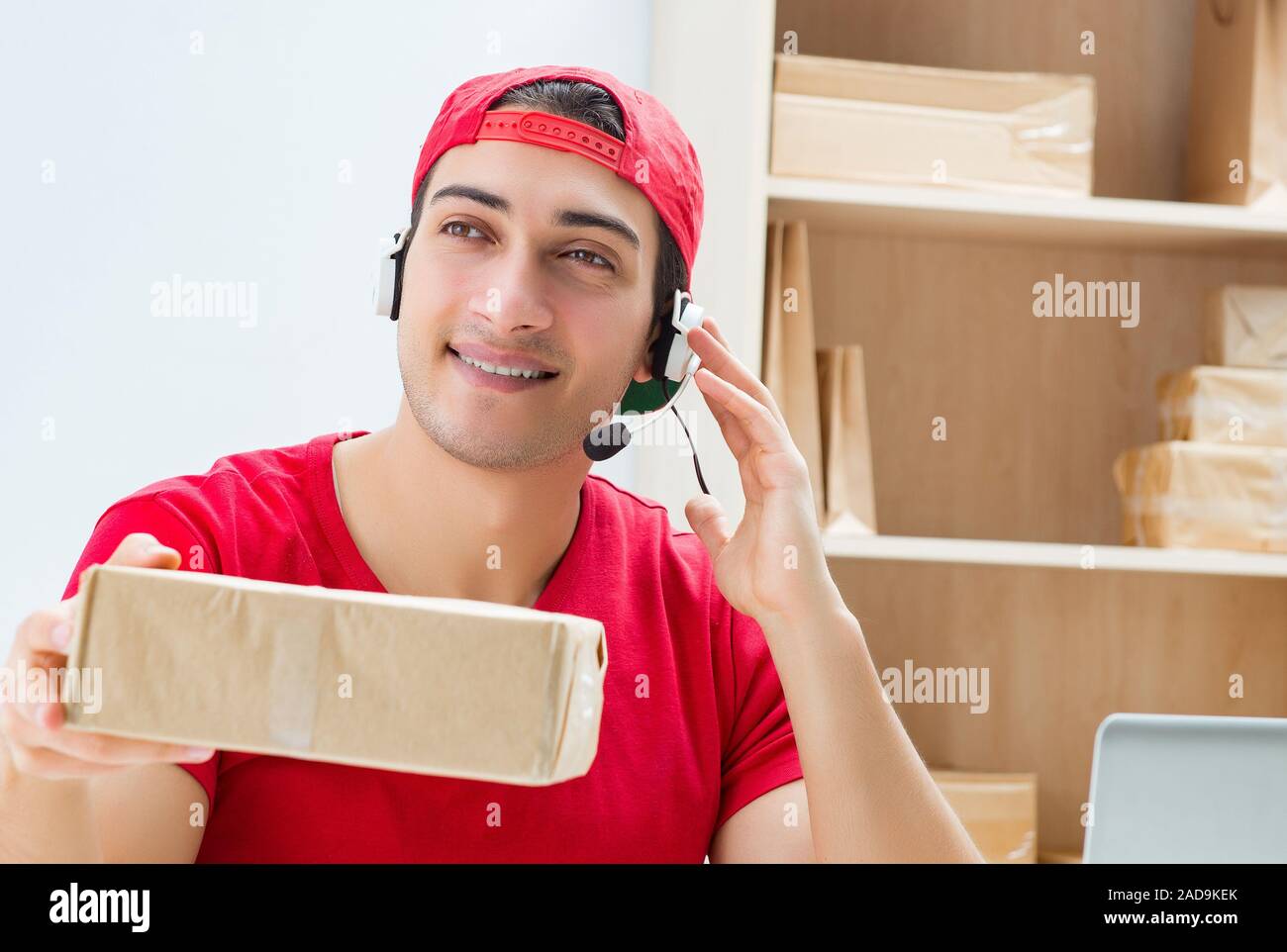 Call center worker at parcel distribution center in post office Stock ...