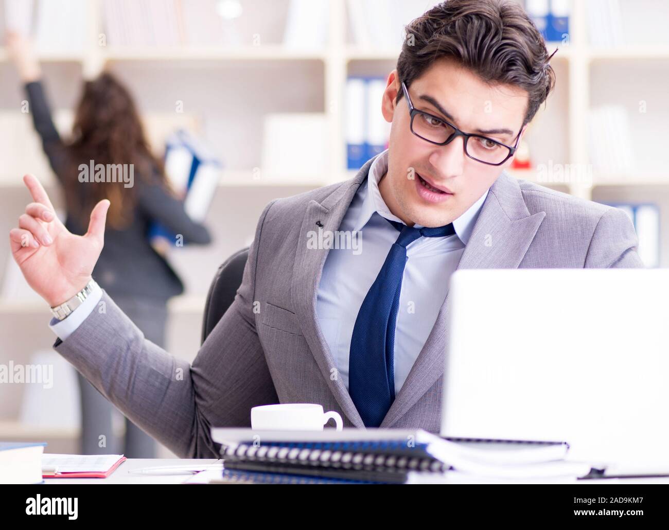 Angry boss unhappy with female employee performance Stock Photo - Alamy