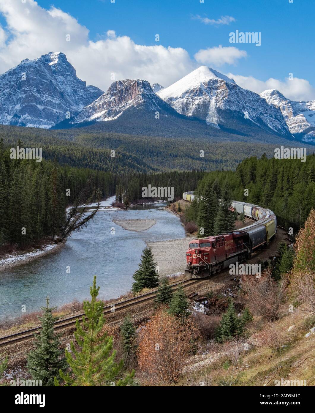 Train coming through the valley in Alberta Canada Stock Photo - Alamy