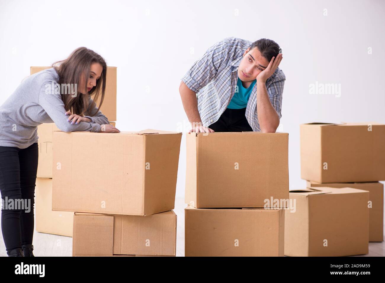 Young pair moving to new flat Stock Photo - Alamy