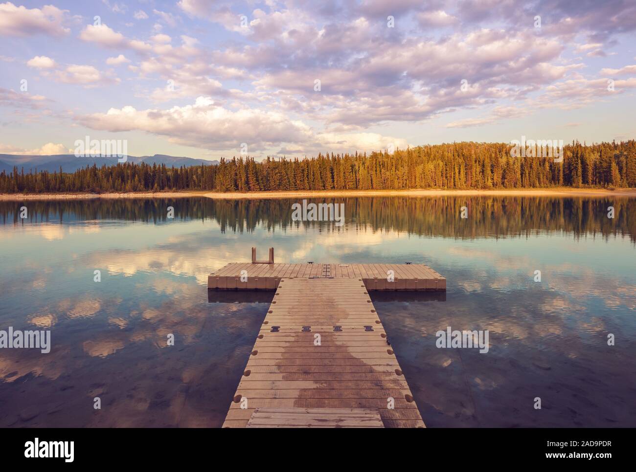 Pier on the lake Stock Photo - Alamy
