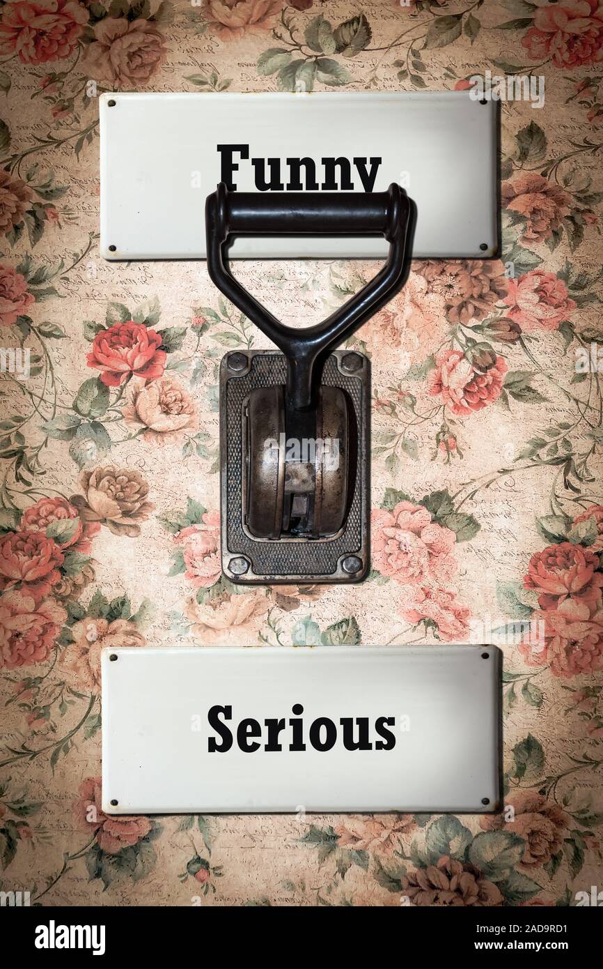 Street Sign Funny versus Serious Stock Photo - Alamy