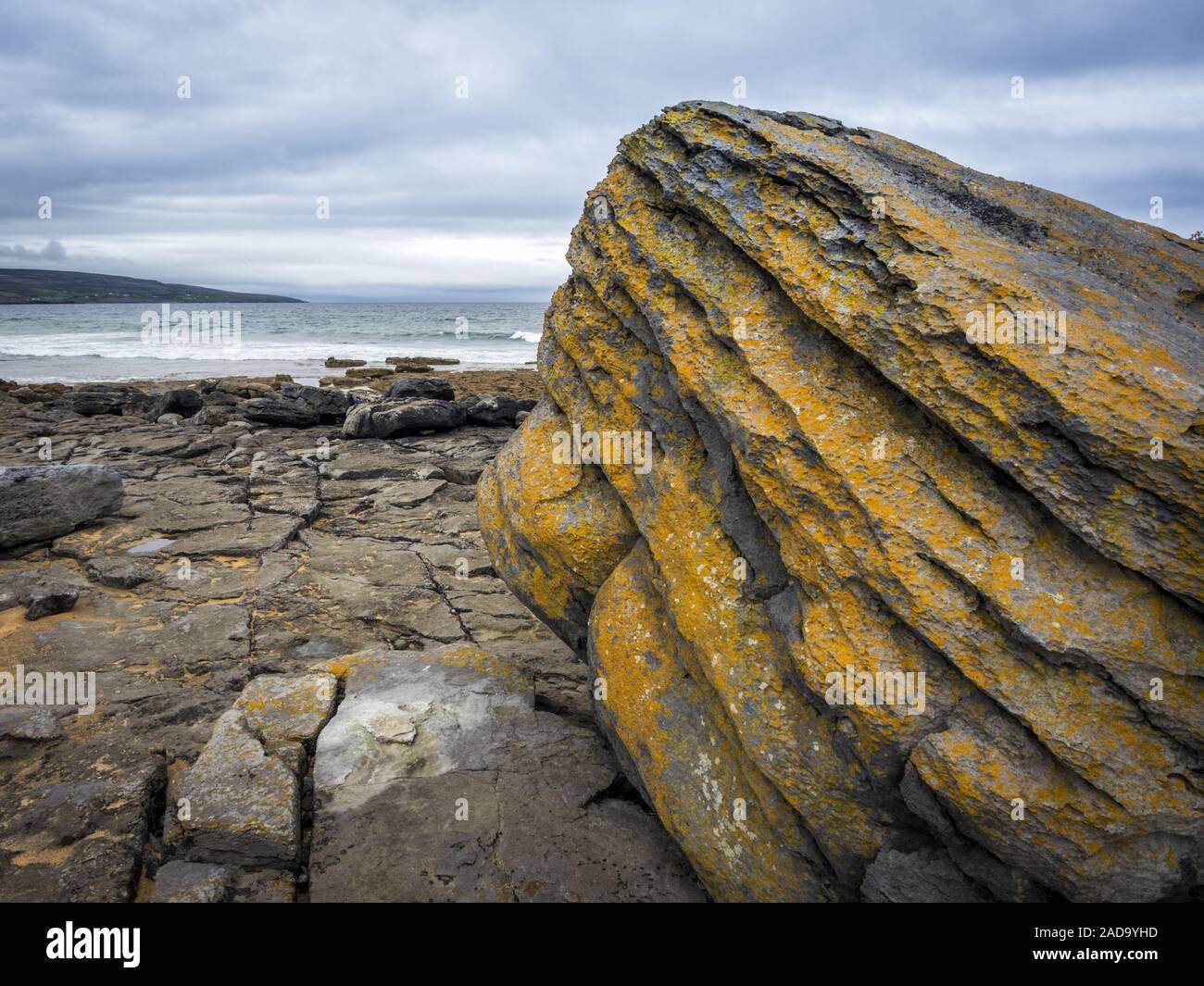 Massive rock on the coastline of Ireland Fanore beach Stock Photo - Alamy
