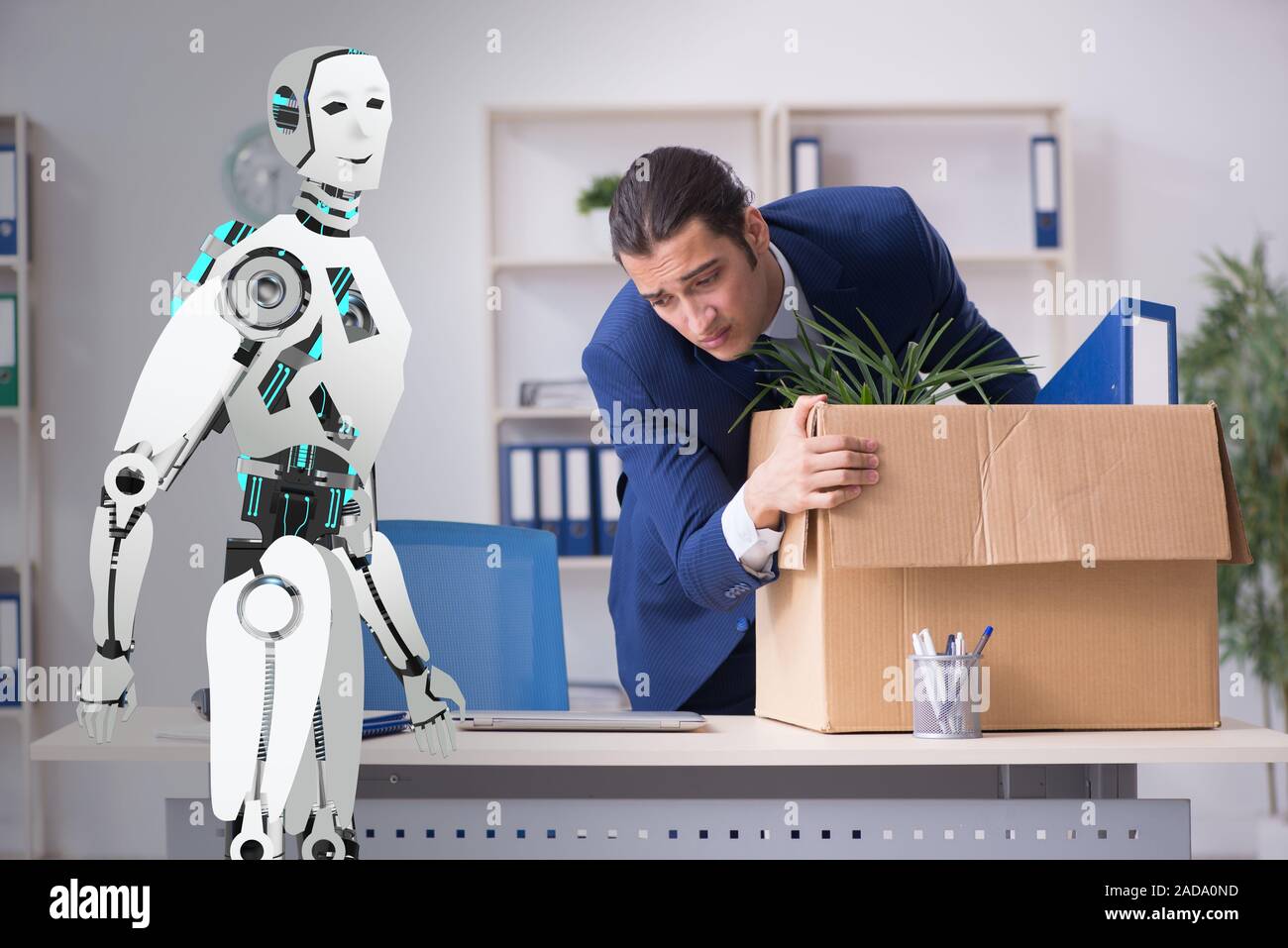 Concept of robots replacing humans in offices Stock Photo - Alamy