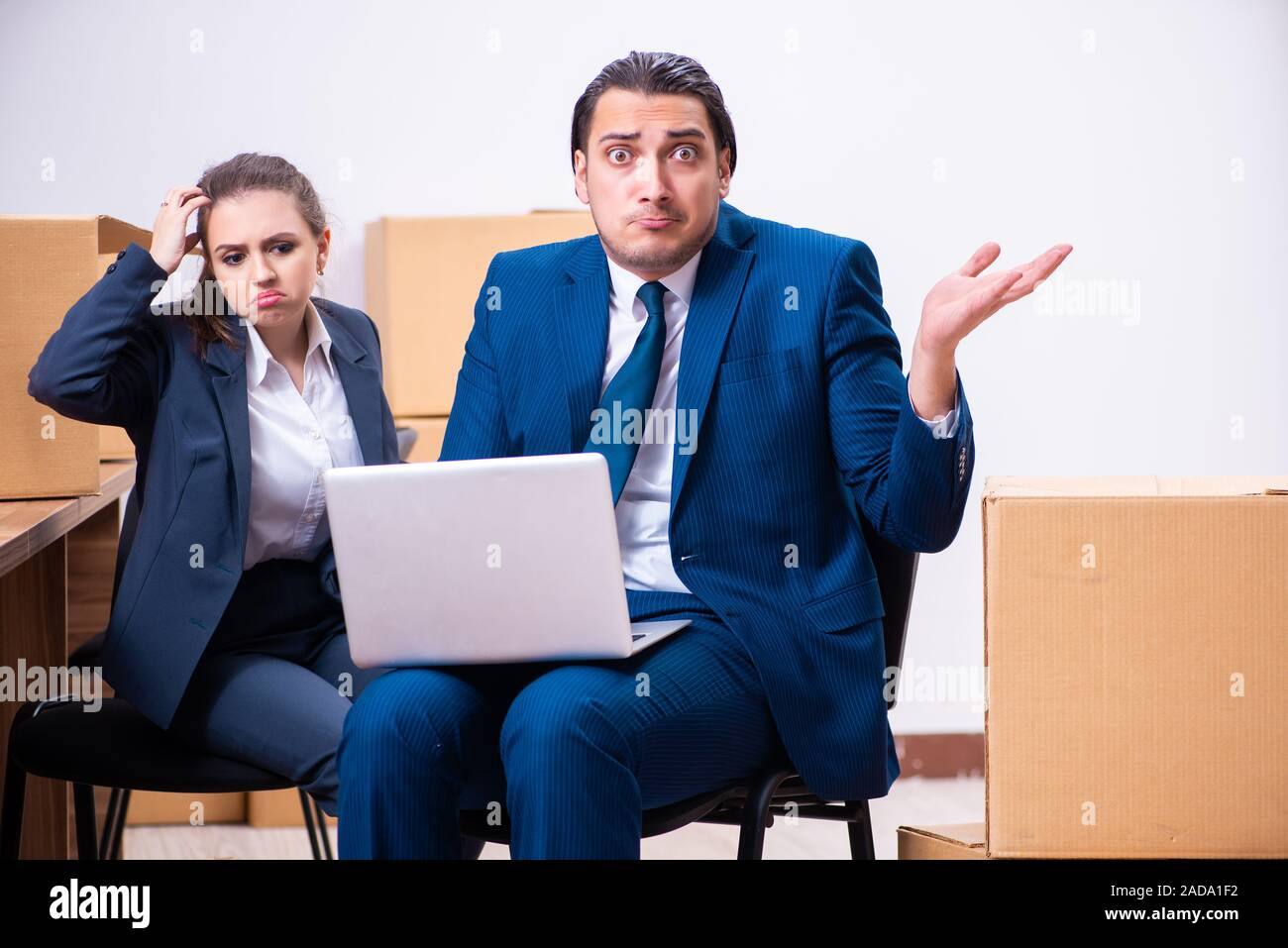 Two employees being fired from their work Stock Photo - Alamy