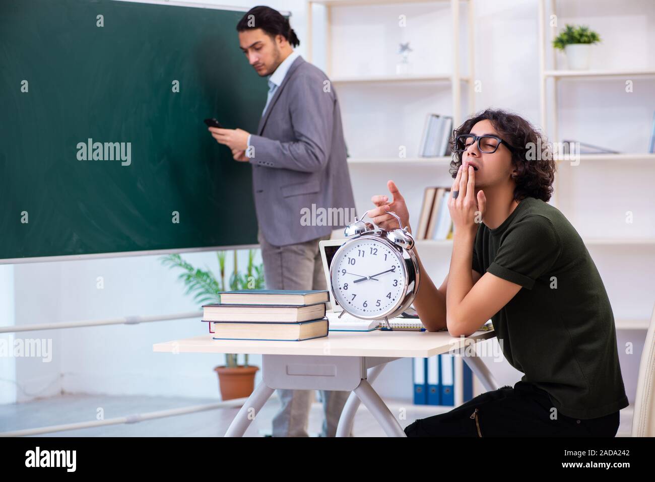 Student yawning classroom hi-res stock photography and images - Alamy