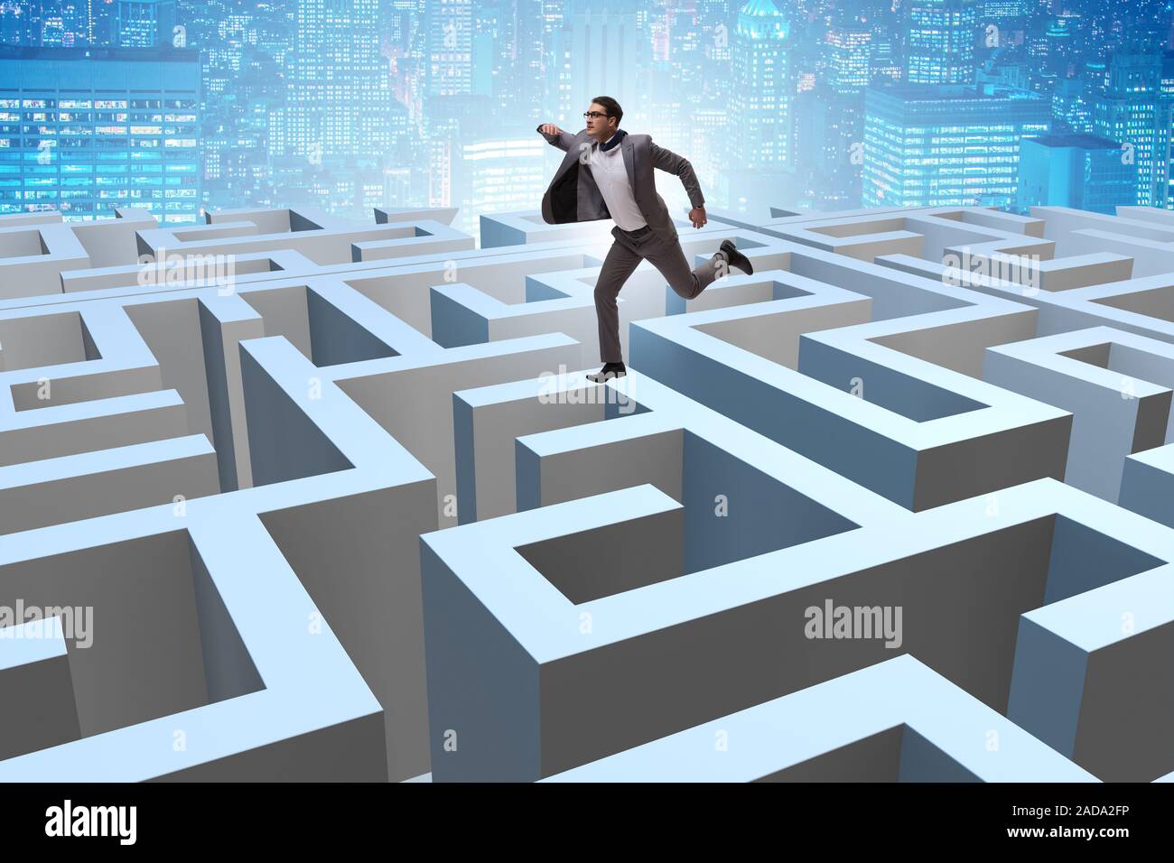 Businessman trying to escape from maze Stock Photo - Alamy