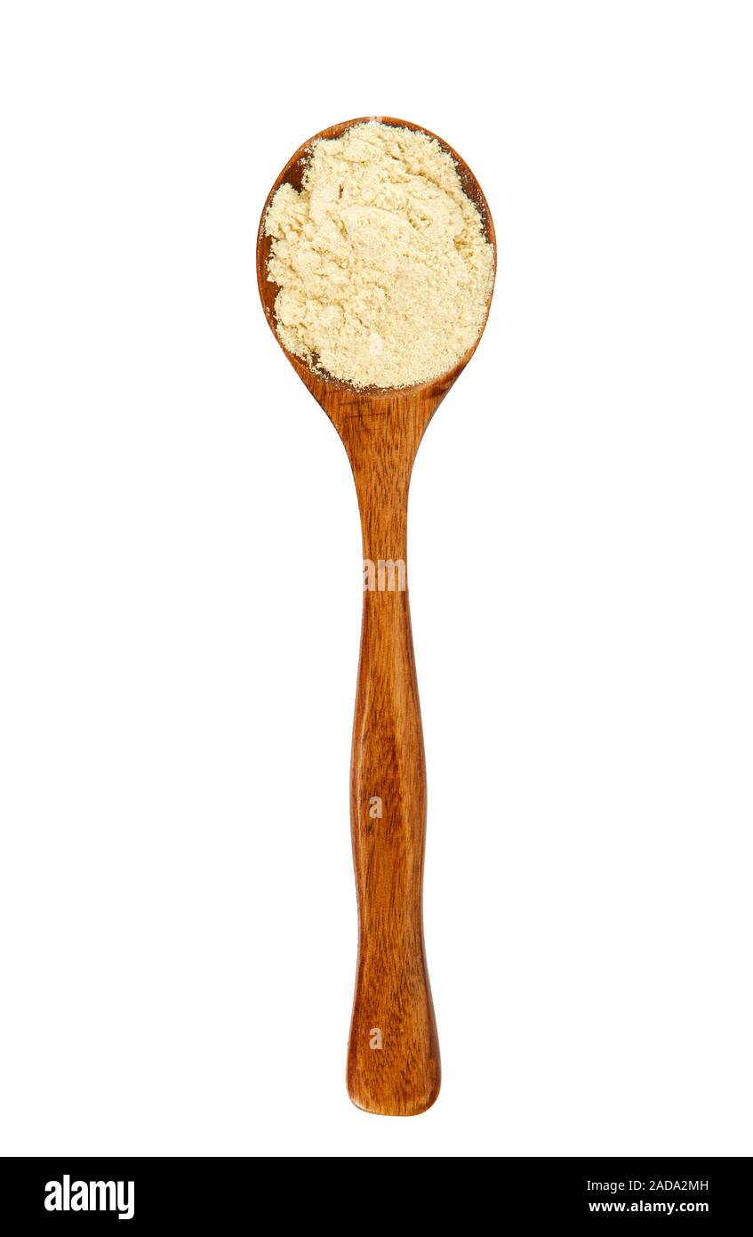 Ground ginger on wooden Cut Out Stock Images & Pictures - Alamy