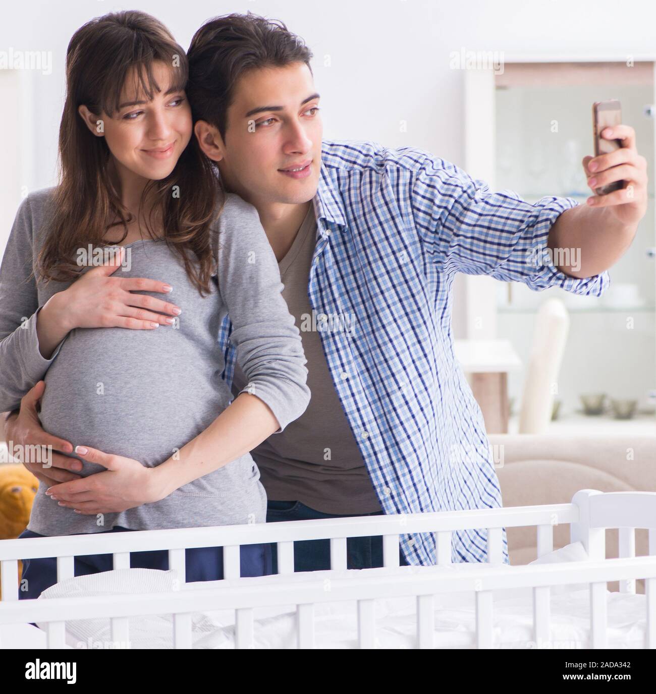 Happy parents taking care newborn hi-res stock photography and images ...