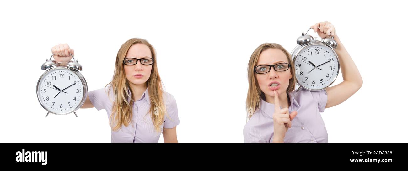 Young employee holding alarm clock isolated on white Stock Photo - Alamy