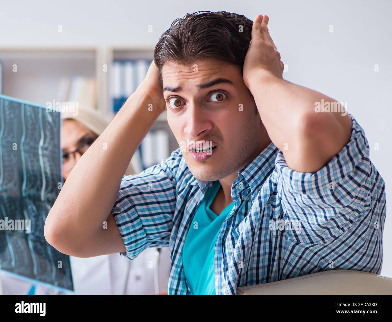 Doctor examining x-ray images of patient Stock Photo - Alamy