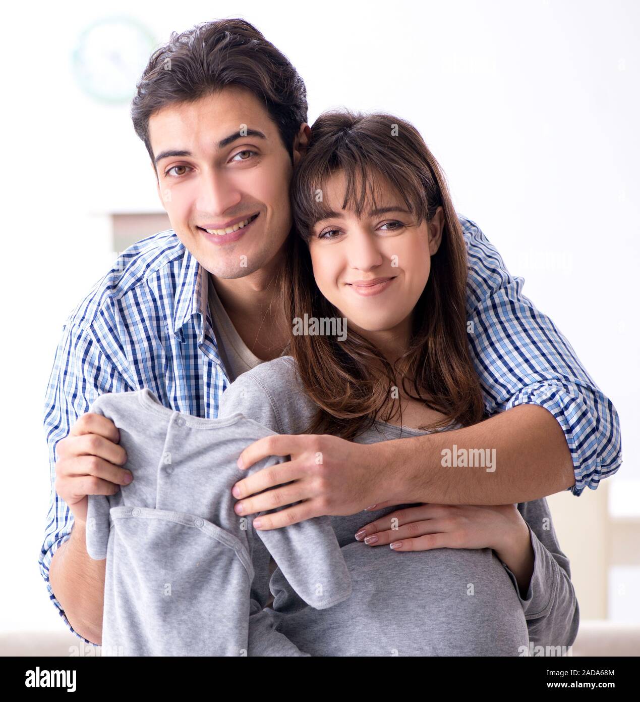 Young parents expecting their first baby Stock Photo - Alamy