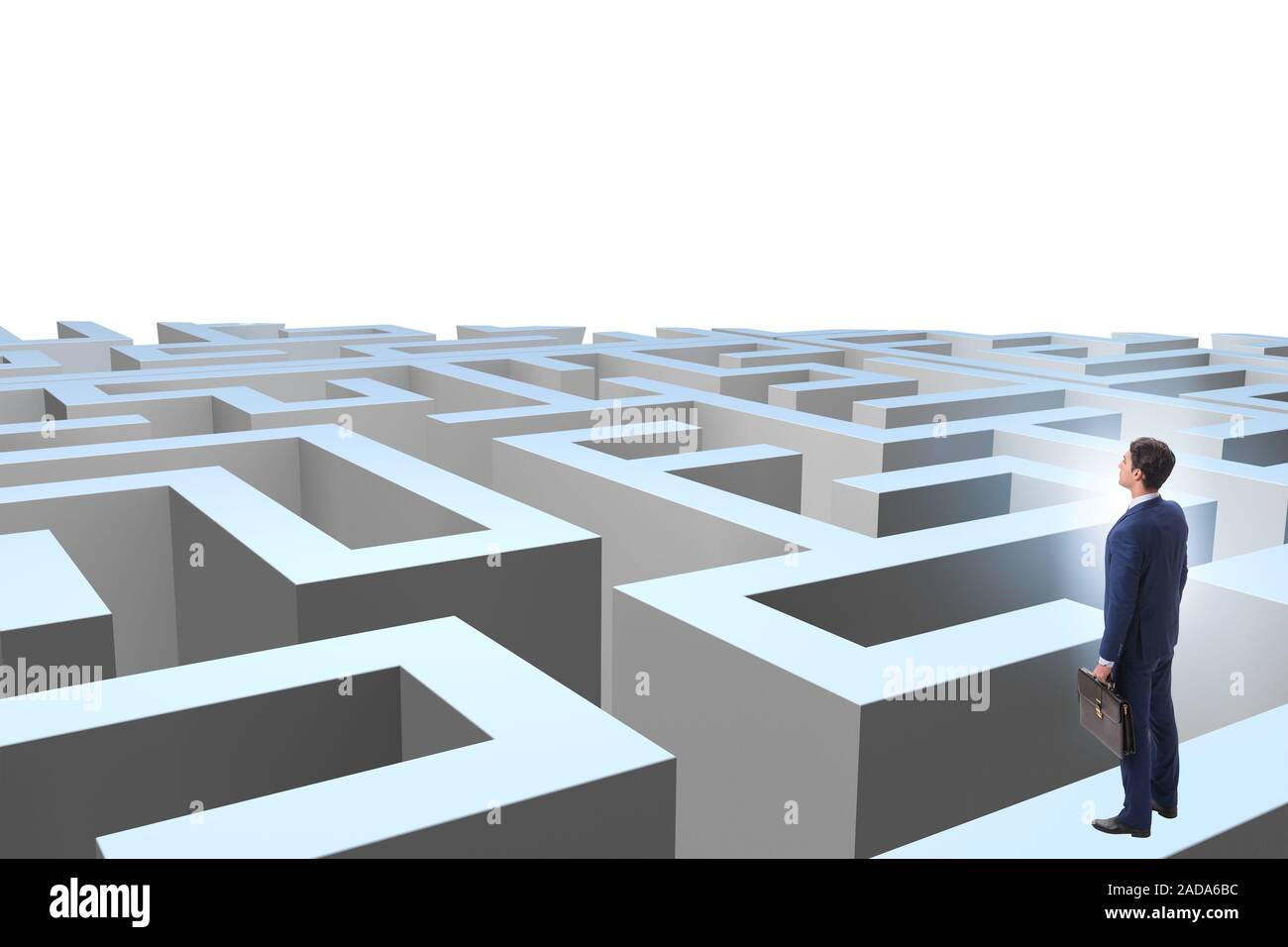 Businessman trying to escape from maze Stock Photo - Alamy