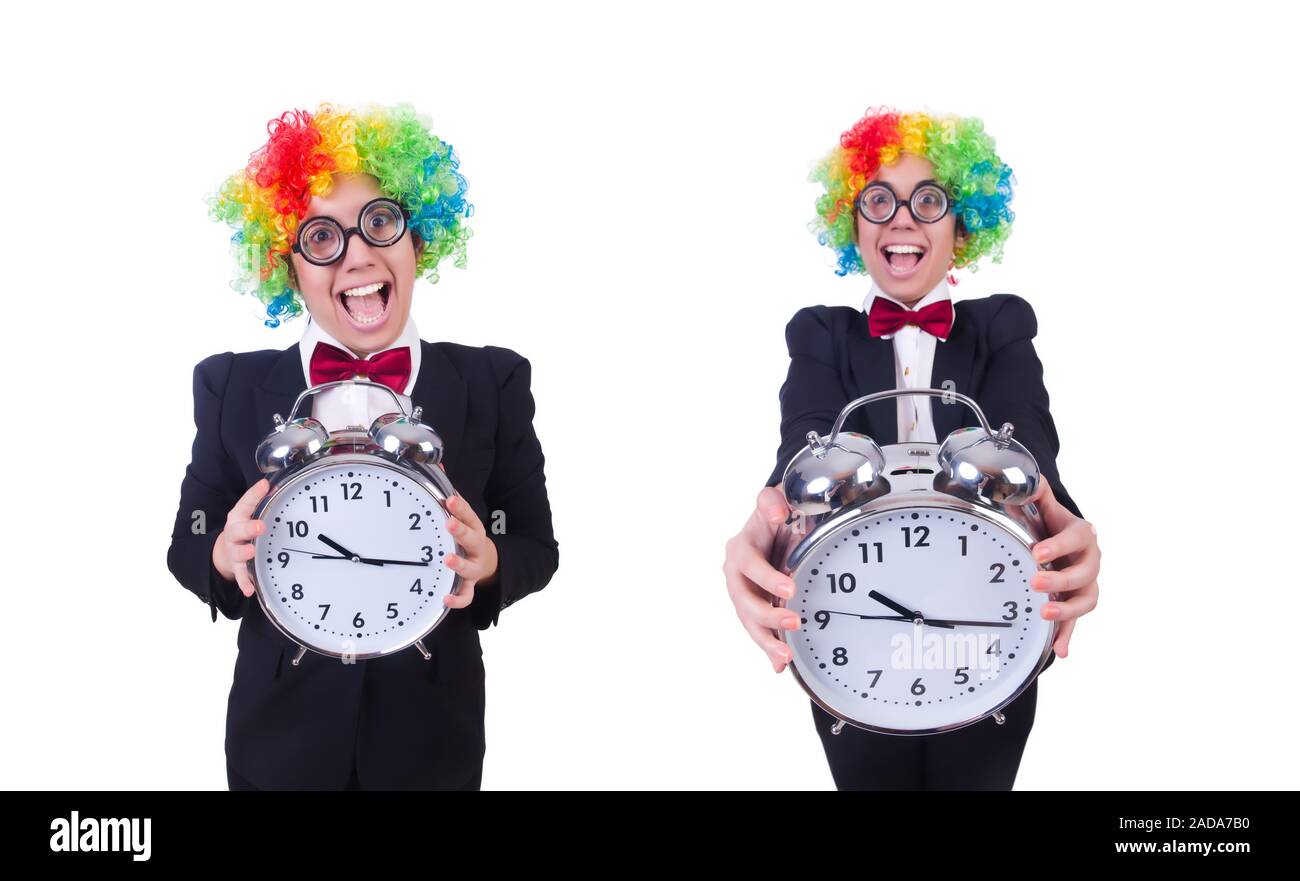 Funny clown with clock on white Stock Photo - Alamy