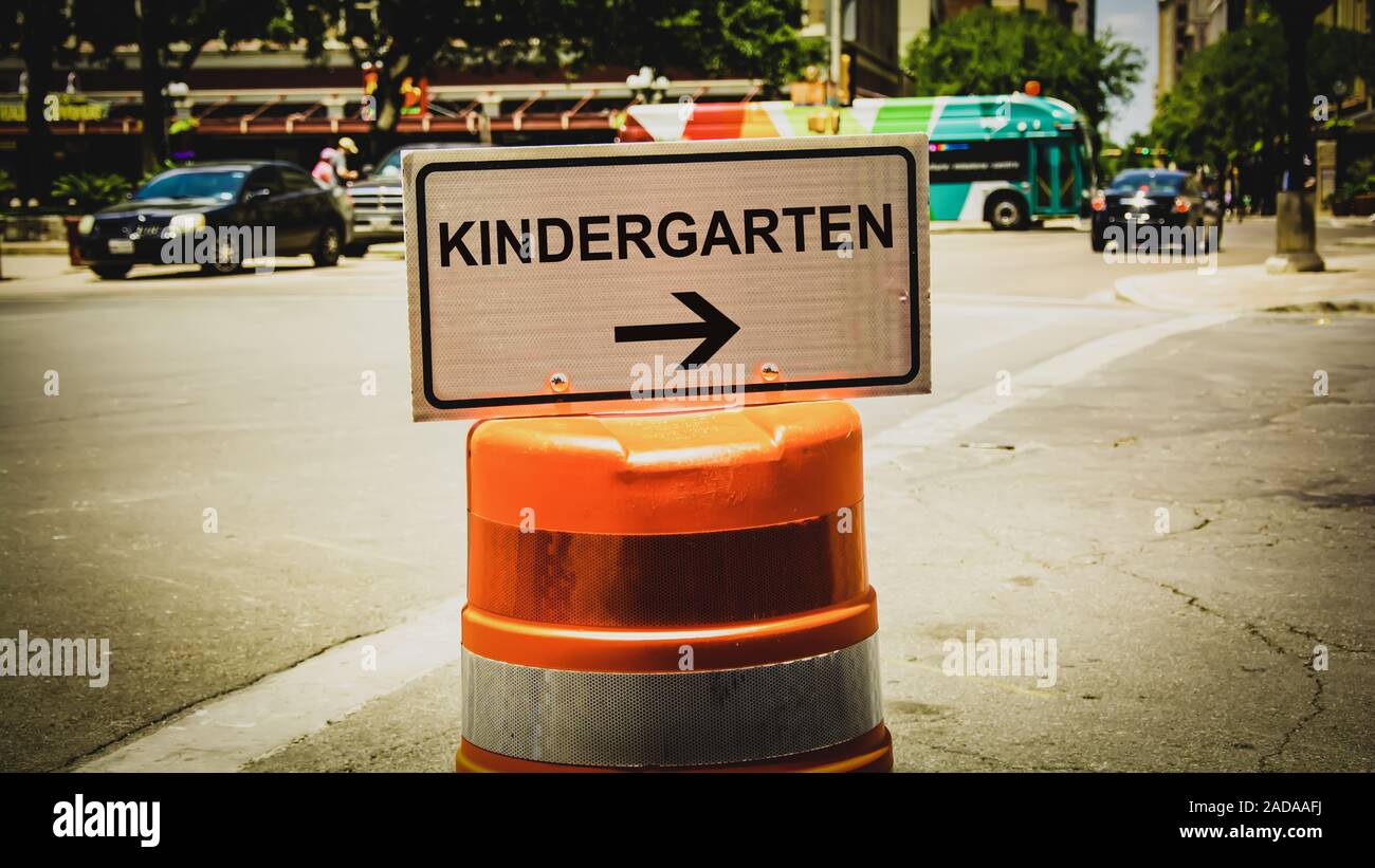 Street Sign to Kindergarten Stock Photo - Alamy