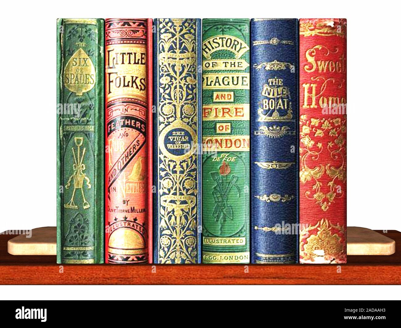 Books with bookends on shelf Stock Photo - Alamy