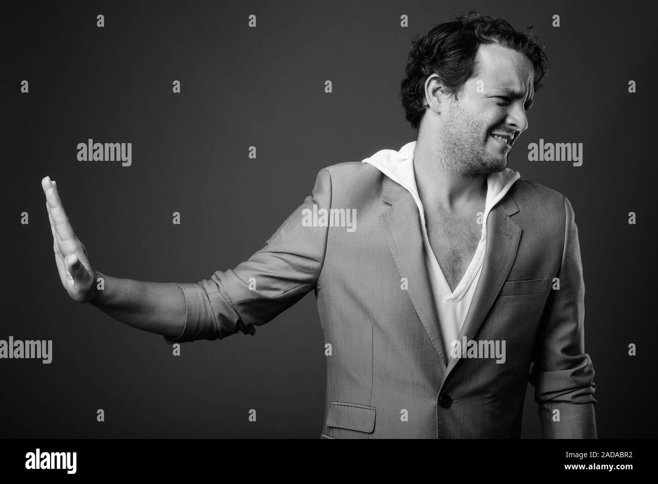 Studio shot of Italian businessman in black and white Stock Photo - Alamy