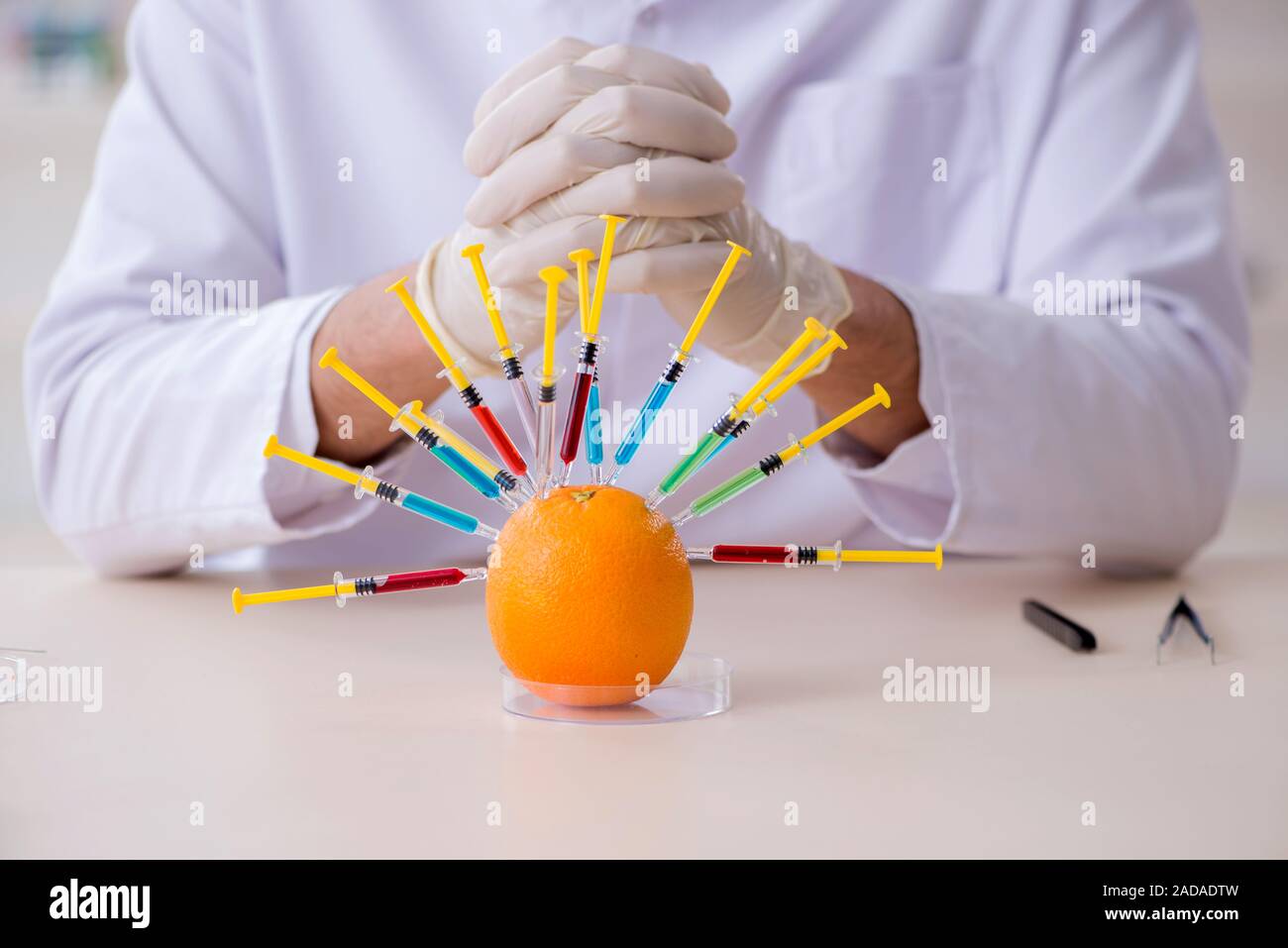 Male nutrition expert testing food products in lab Stock Photo - Alamy