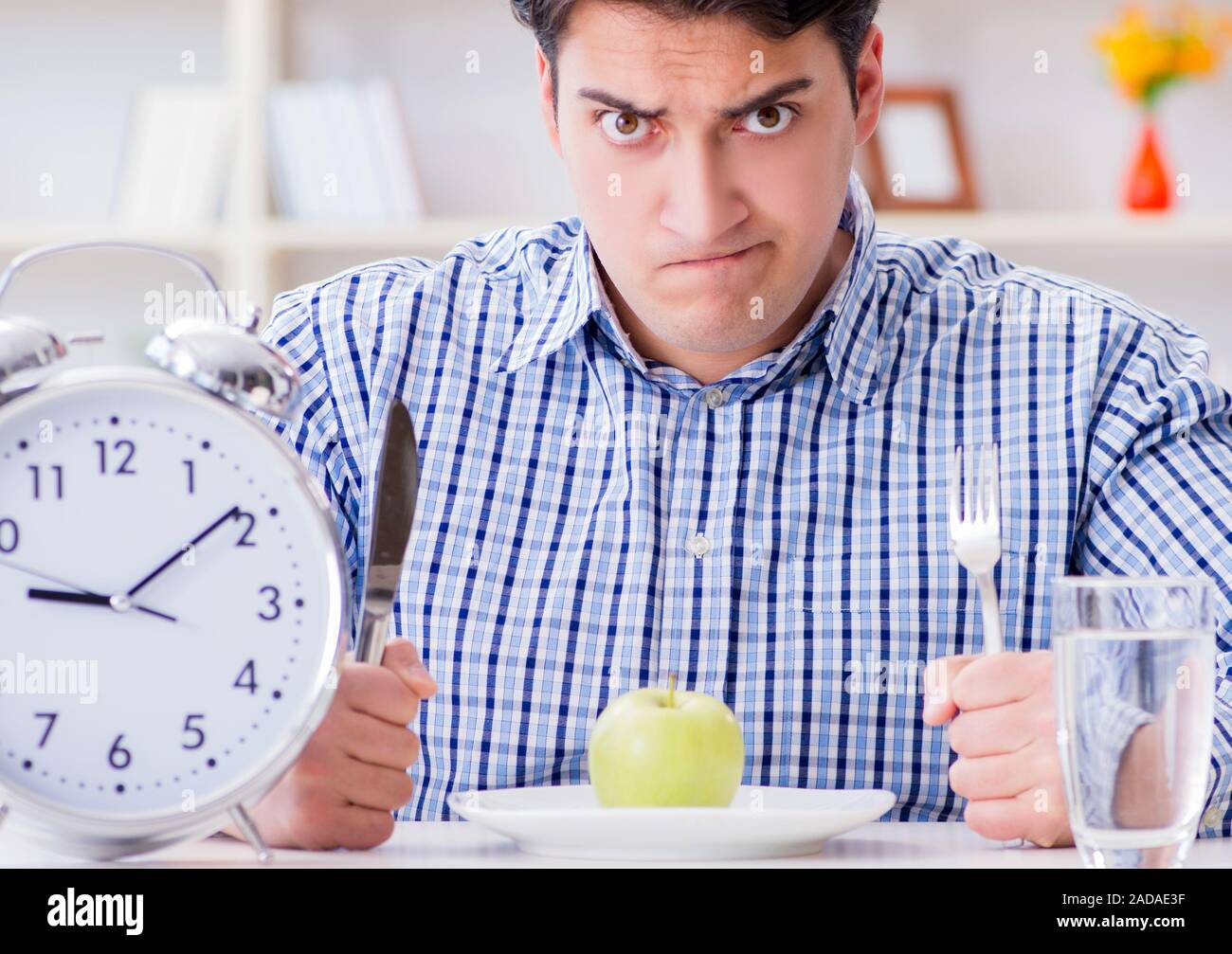 Angry man waiting food in hi-res stock photography and images - Alamy