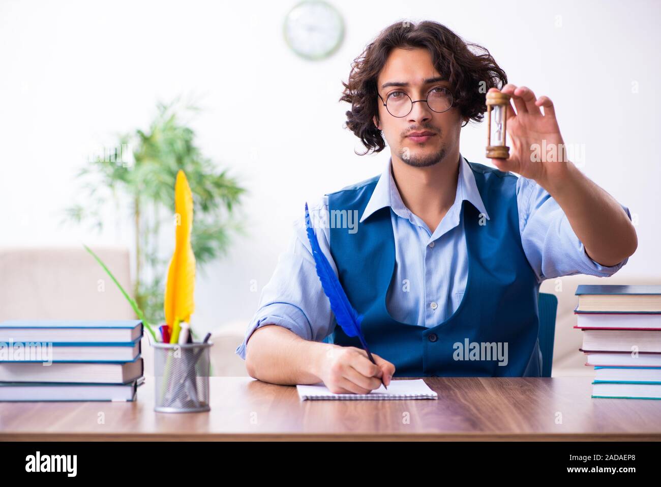 Young writer working on his new work Stock Photo - Alamy