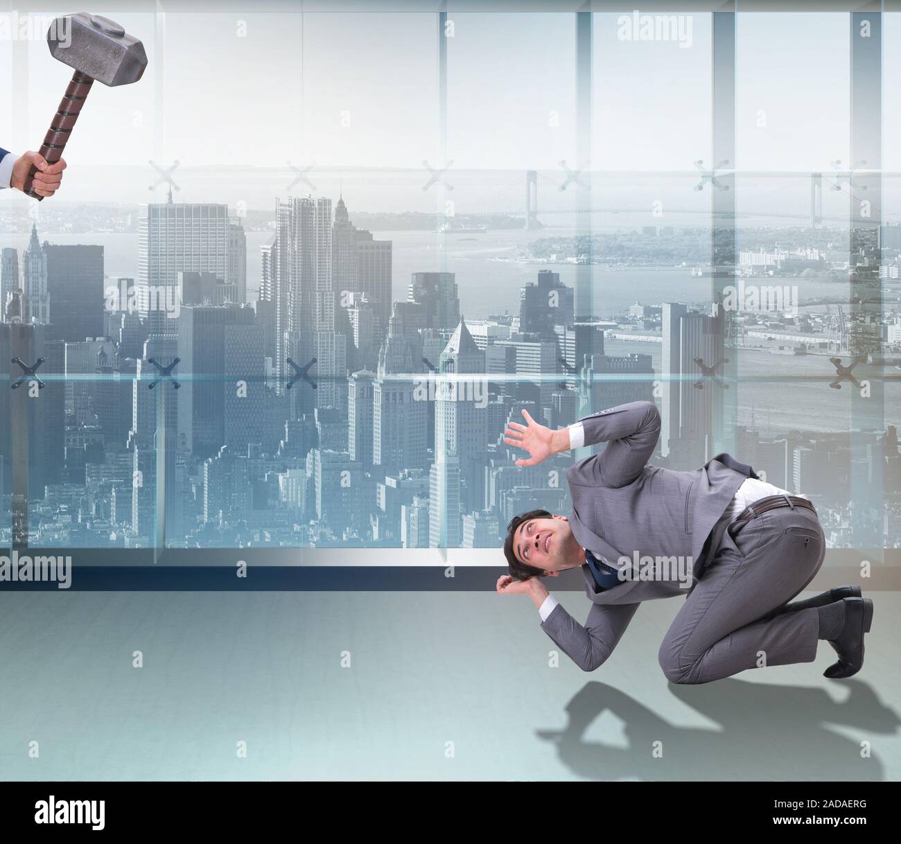 Bad angry boss threatening employee with hammer Stock Photo - Alamy