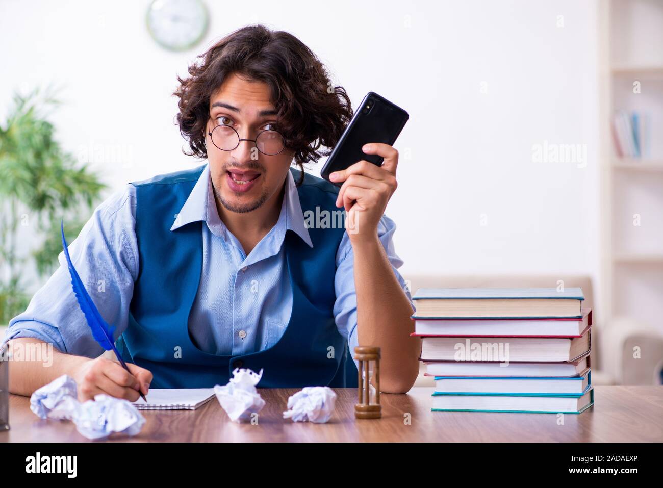 Young writer working on his new work Stock Photo - Alamy