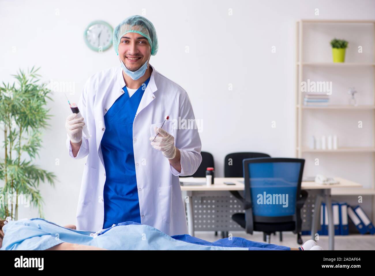 Female patient getting an injection in the clinic Stock Photo - Alamy