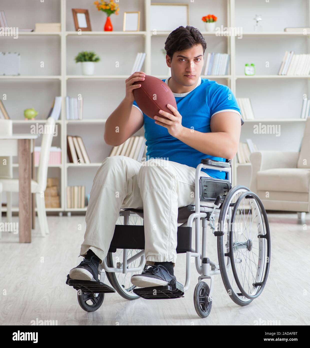 Young man american football player recovering on wheelchair Stock Photo ...
