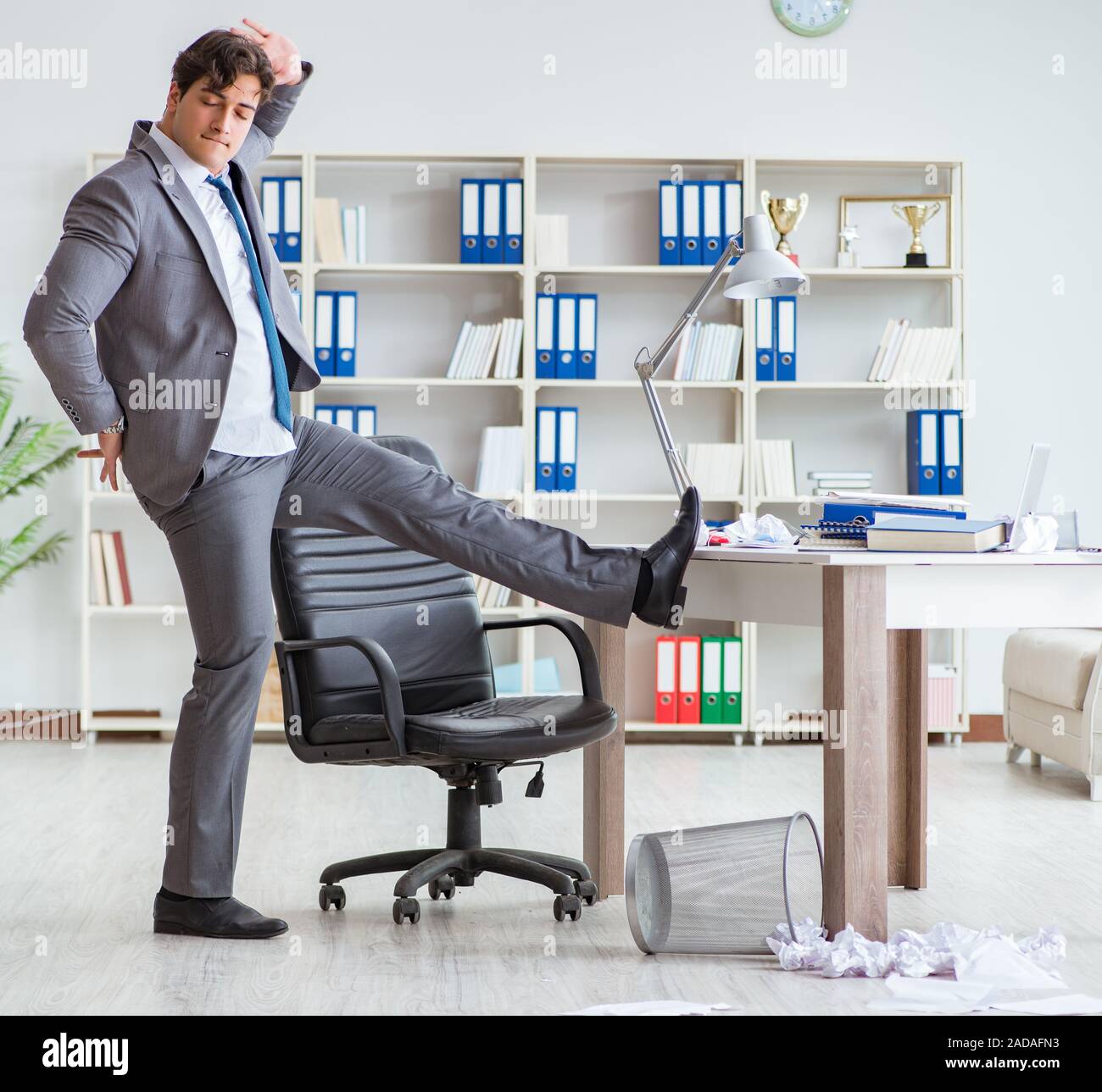 Businessman having fun taking a break in the office at work Stock Photo ...