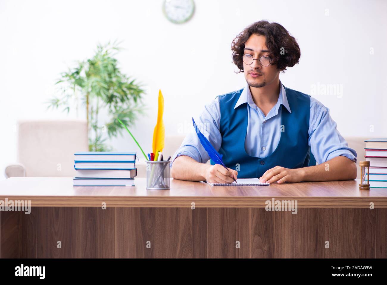 Young writer working on his new work Stock Photo - Alamy