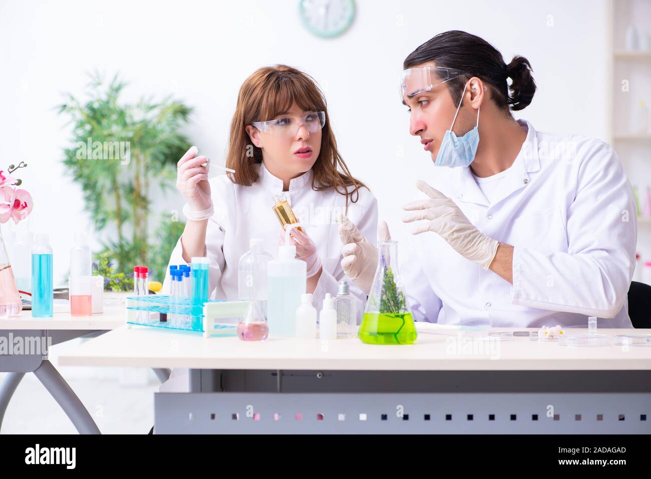Woman taking bottle perfume hi-res stock photography and images - Alamy