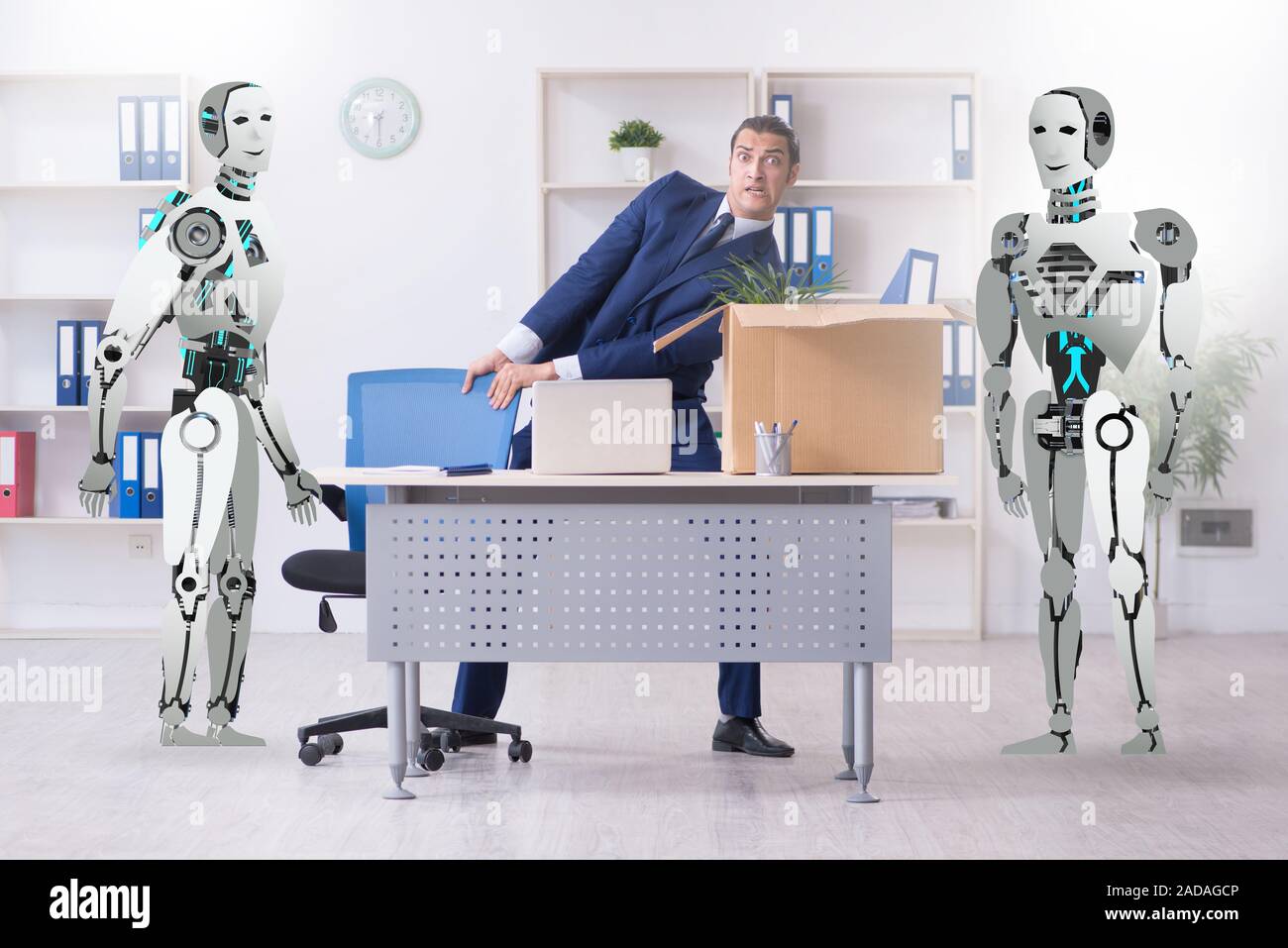 Concept of robots replacing humans in offices Stock Photo - Alamy