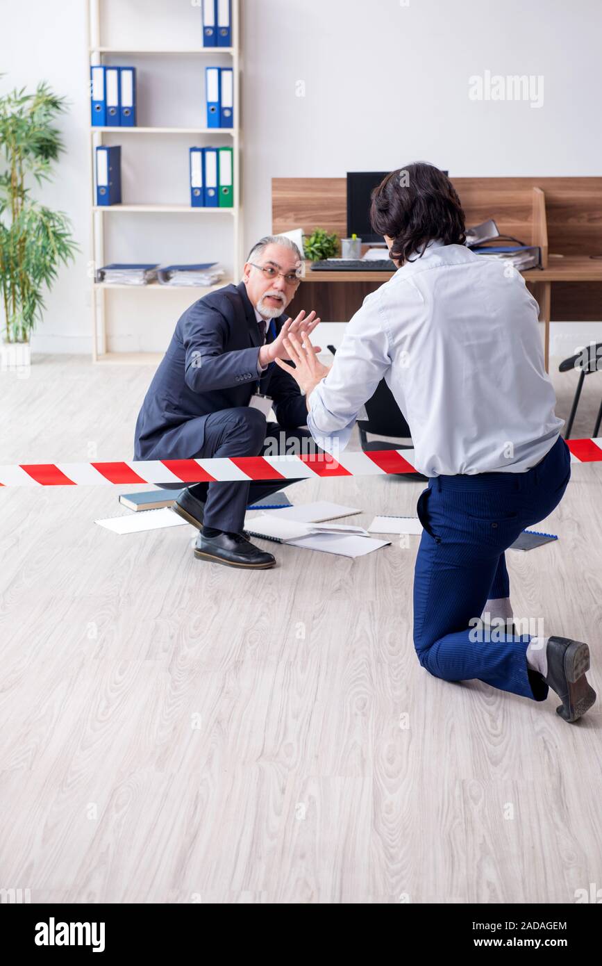 Forensic investigator investigating theft hi-res stock photography and ...