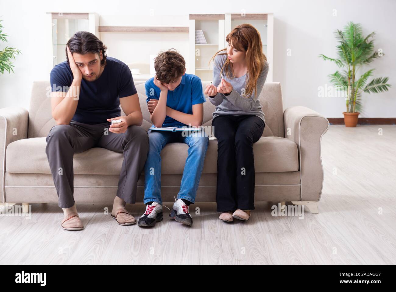 Concept of underage smoking with young boy and family Stock Photo - Alamy