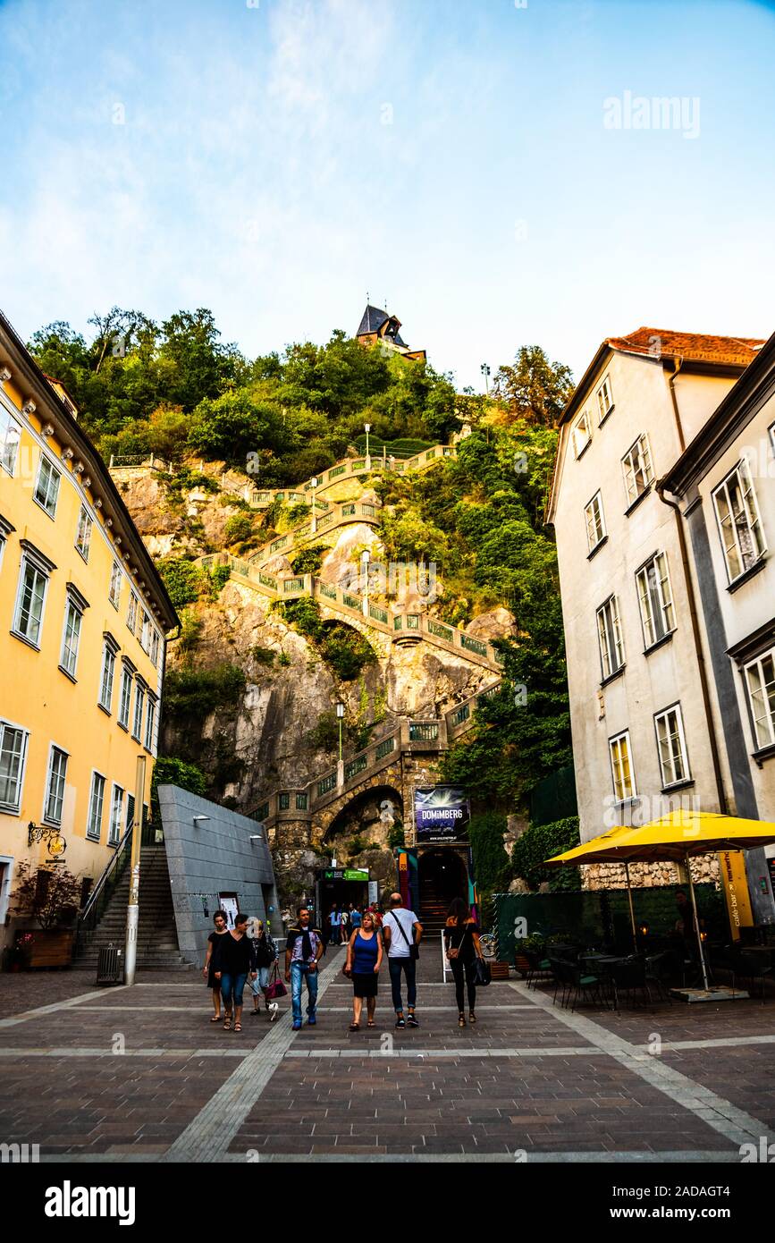 Clock tower over buildings hi-res stock photography and images - Alamy