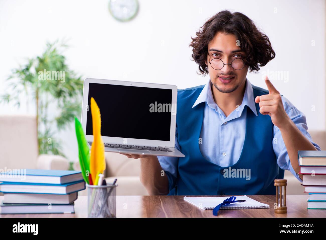 Young writer working on his new work Stock Photo - Alamy