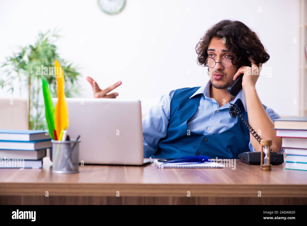 Young writer working on his new work Stock Photo - Alamy