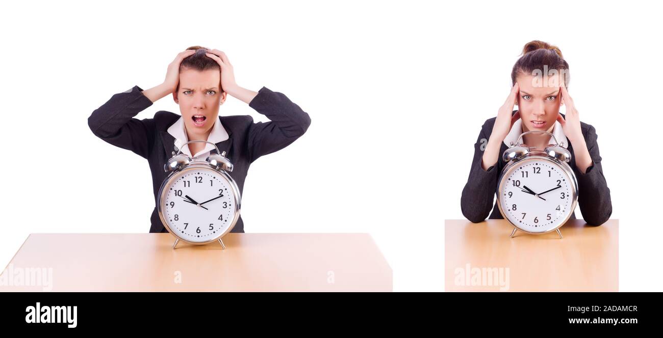 Businesswoman with clock missing her deadlines Stock Photo - Alamy