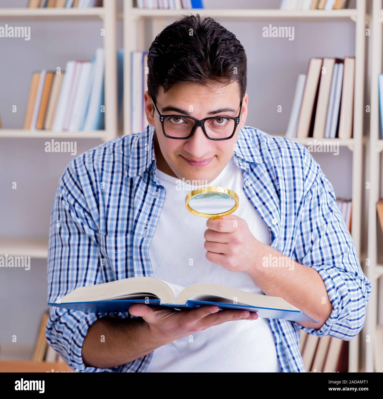 Young student with books preparing for exams Stock Photo - Alamy