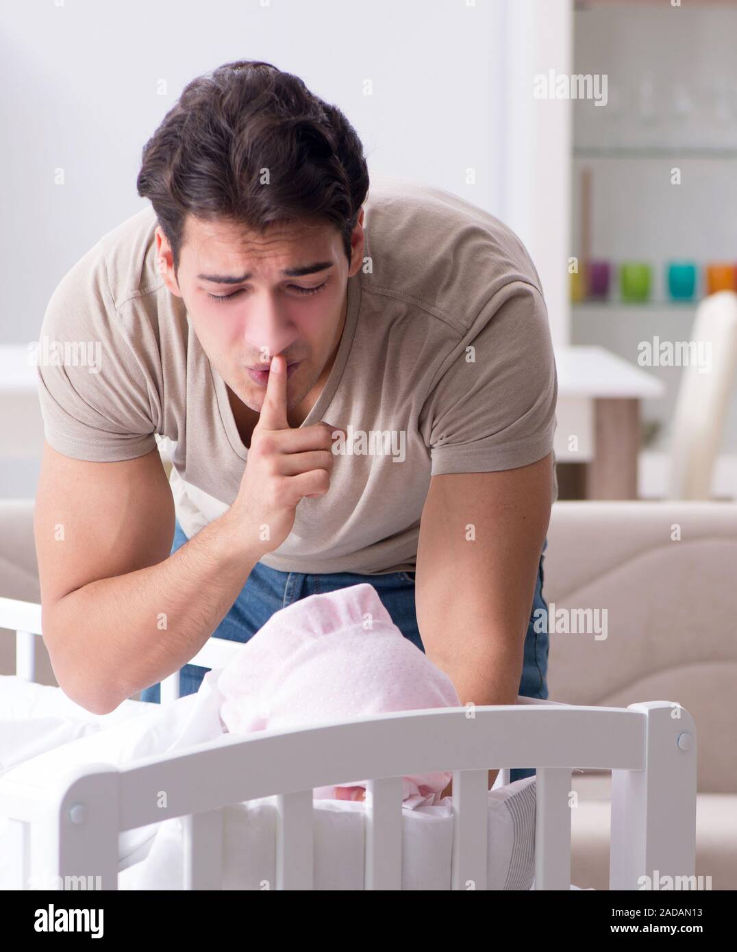 Young father dad frustrated at crying baby Stock Photo - Alamy