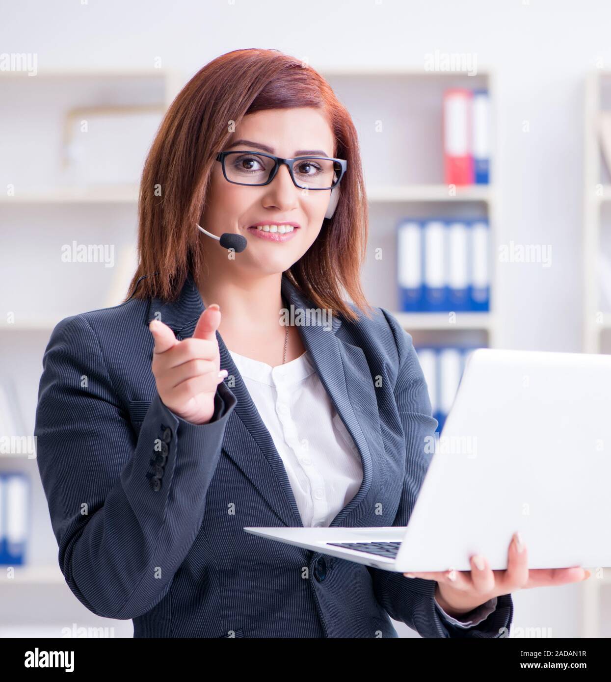 Call center operator working with clients Stock Photo - Alamy