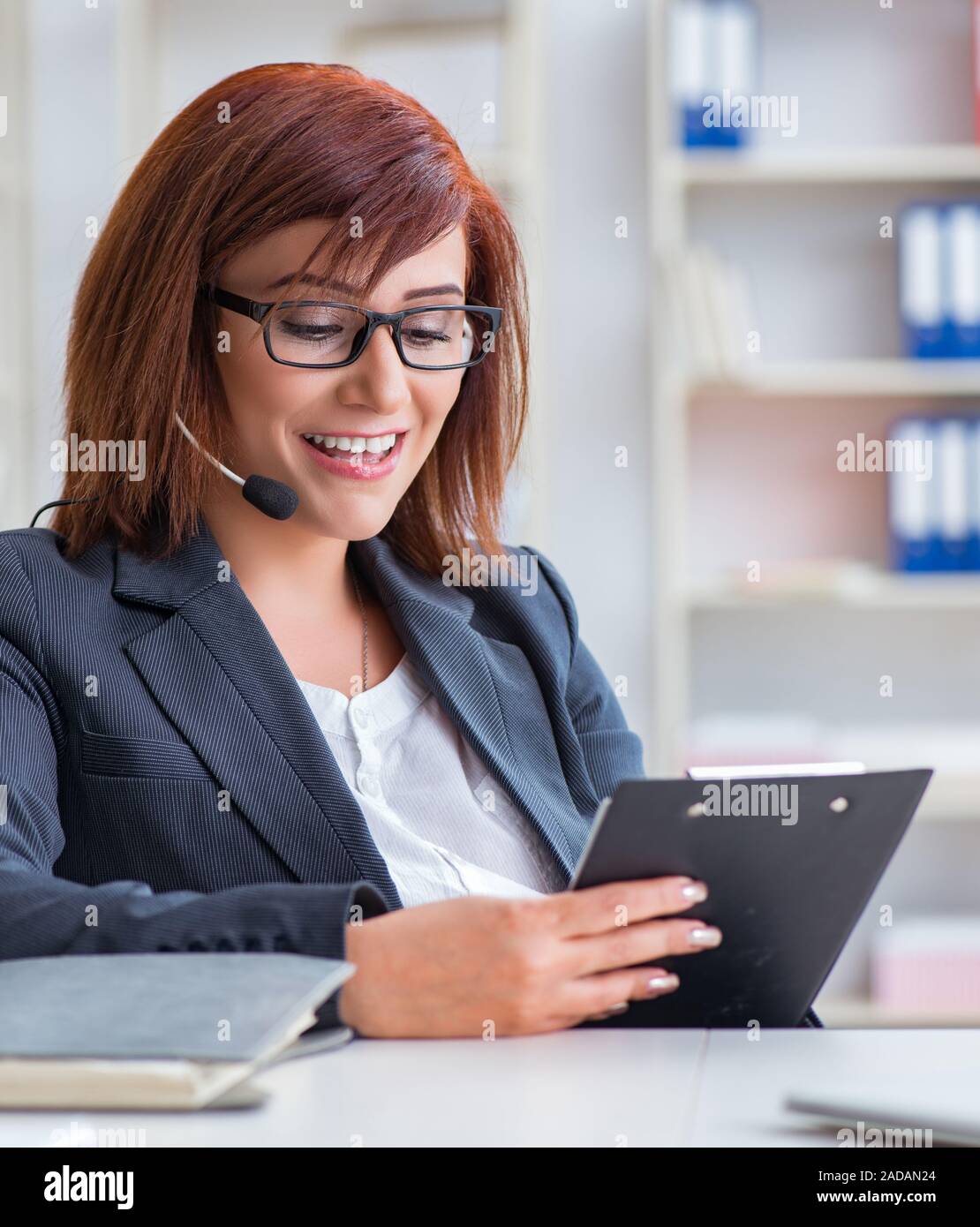 Call center operator working with clients Stock Photo - Alamy