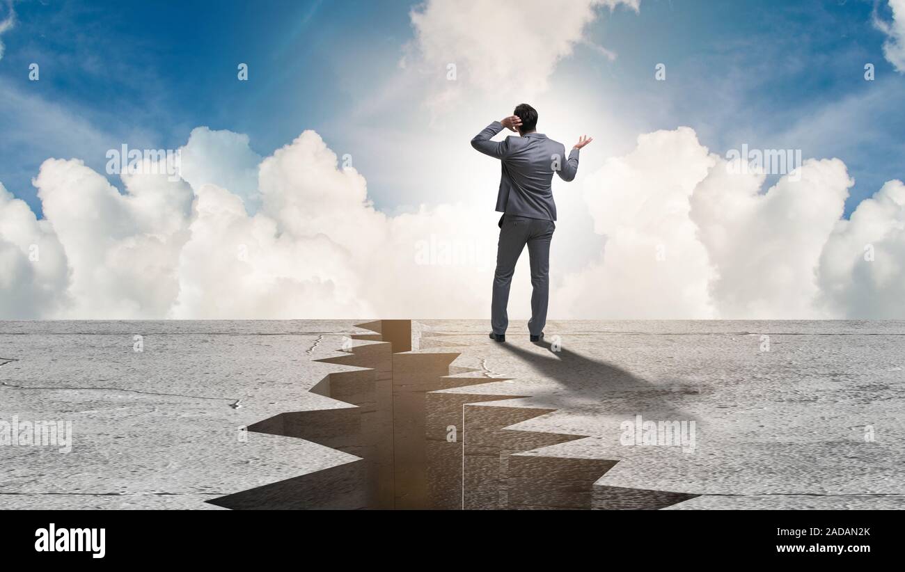 Businessman standing unsure next to cliff hi-res stock photography and ...