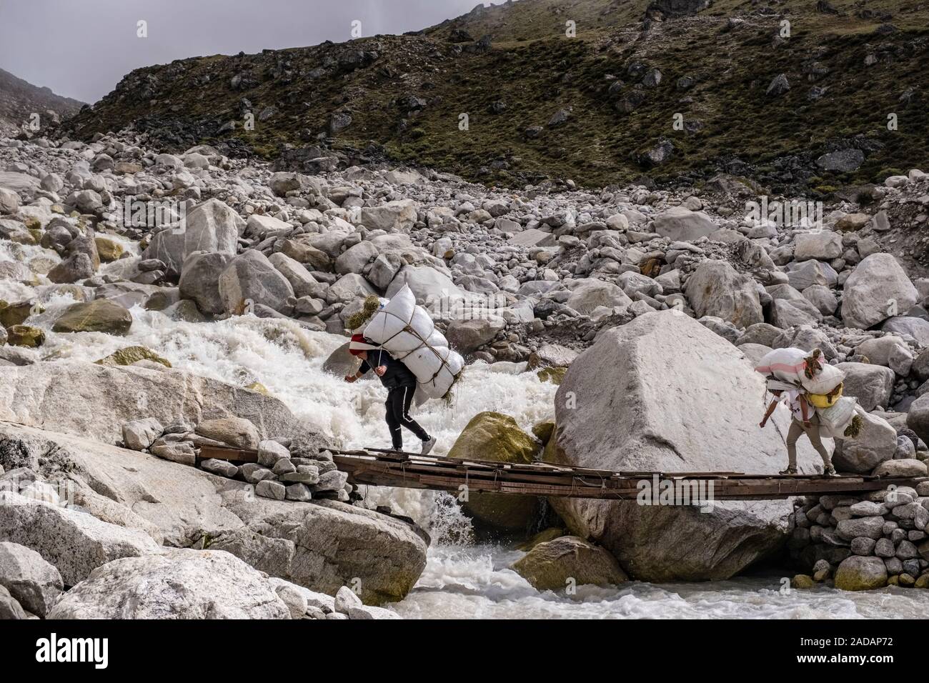 Carrying heavy load on hills hi-res stock photography and images - Alamy