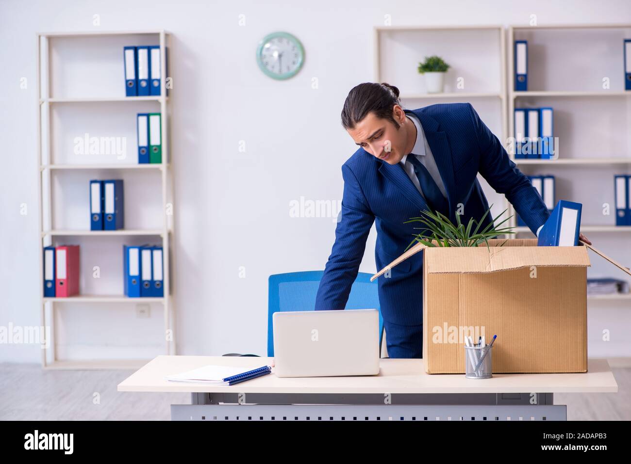 Young employee being made redundant Stock Photo - Alamy